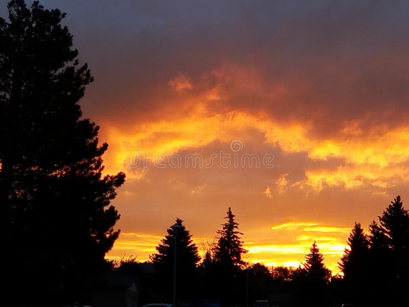 Fire of the Sun. stock photo. Image of clouds, sunset - 137227236
