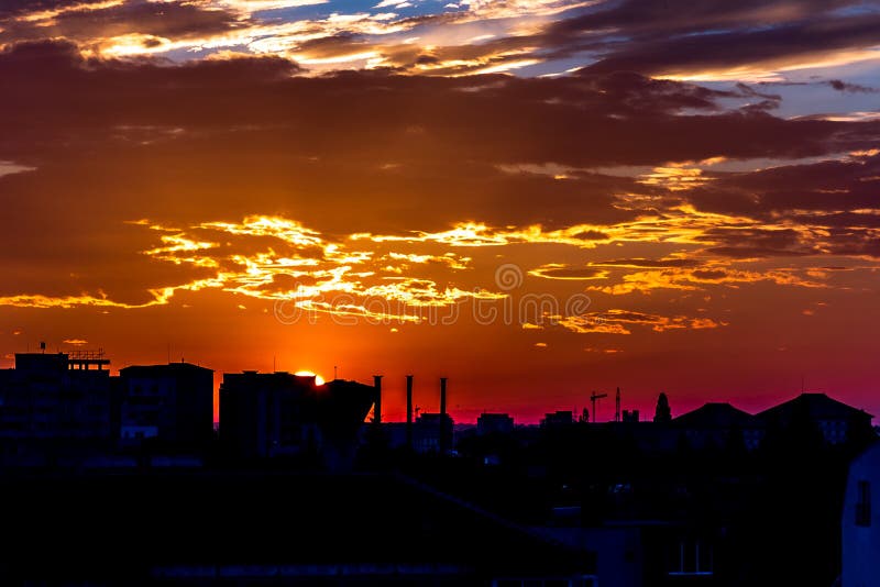 Fire sunset over the city stock photo. Image of cloud - 251786360