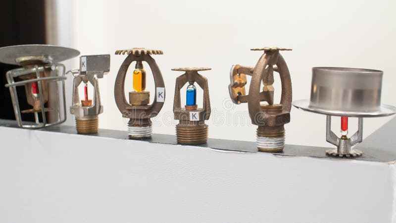 Fire Sprinkler Heads with Fusible Links and Frangible Bulbs Stock Image ... Fire Sprinkler Heads with Fusible Links and Frangible Bulbs Stock Image ...
