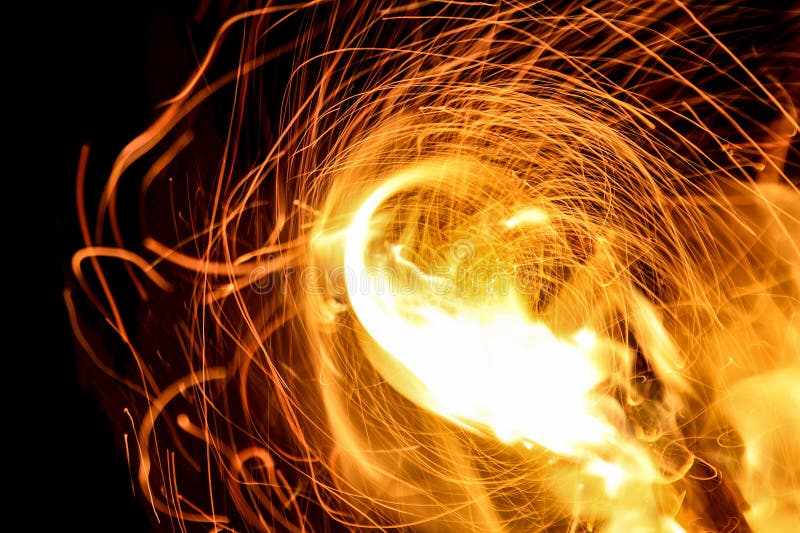 Fire with Swirls of Sparks in the Night Stock Photo - Image of ...