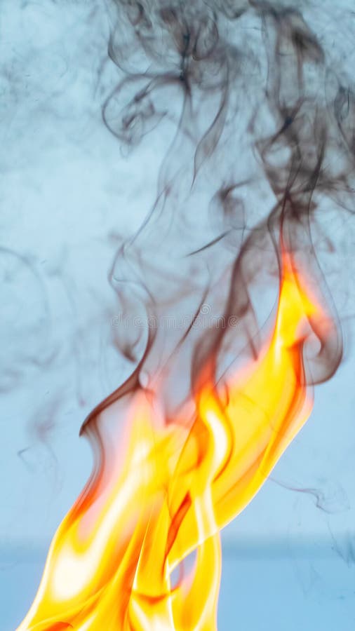 Fire and Thick Black Smoke on a Light Blue Background Stock Photo ... Fire and Thick Black Smoke on a Light Blue Background Stock Photo ...
