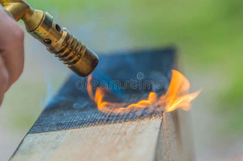 Fire Treated Hardwood Timber. Stock Photo - Image of metal, heat: 98633218