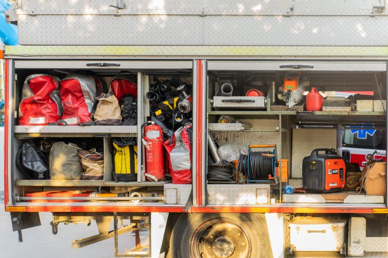 Detailed View of a Fire Truck with Various Firefighting Equipment and ...