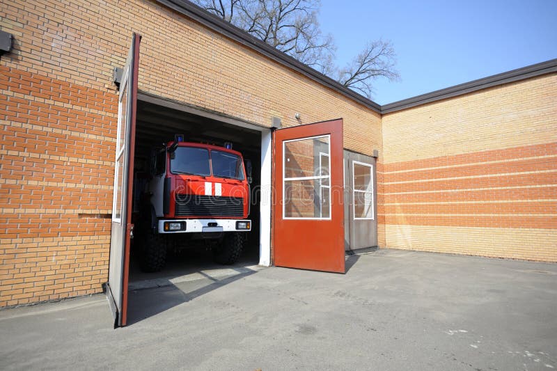 Fire Truck Driving Out of the Garage for Firefighting, Firehouse Stock ...