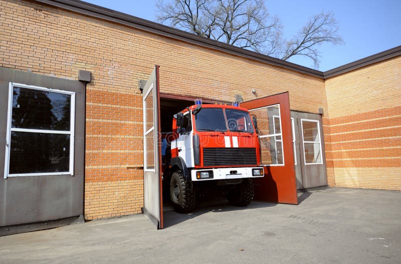 Fire Truck Driving Out of the Garage for Firefighting, Firehouse Stock ...