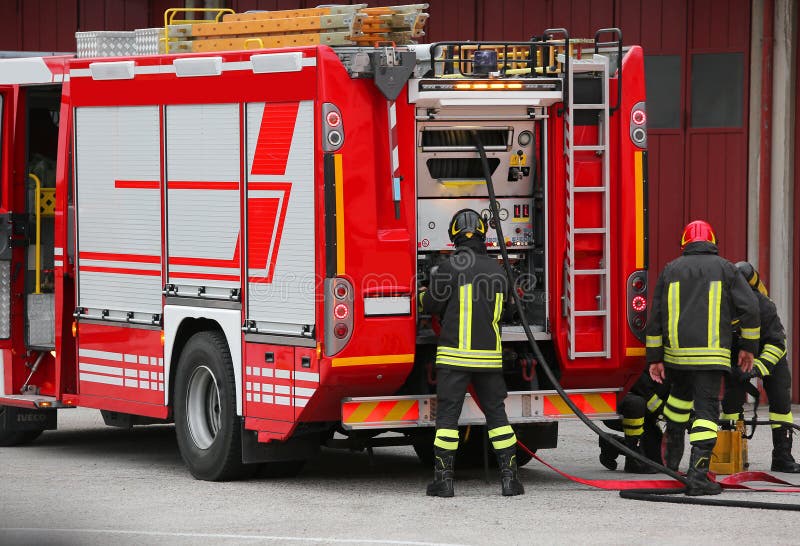 Fire Truck in an Emergency and Active People Stock Image - Image of ...
