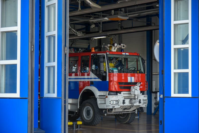 The Fire Truck is in the Garage Box of the Fire Station Stock Photo ...