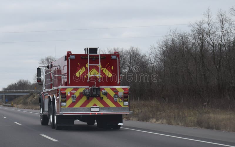 Fire Truck on Highway with Flame Design Stock Photo - Image of ...