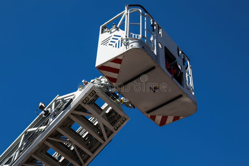 Fire Truck Ladder with Basket on Blue Sky Background Stock Photo ...