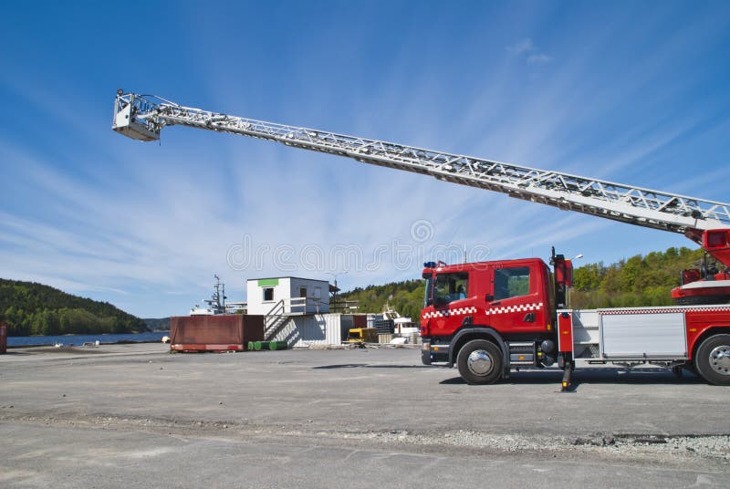 Fire truck (ladder car) stock image. Image of burning - 24995075