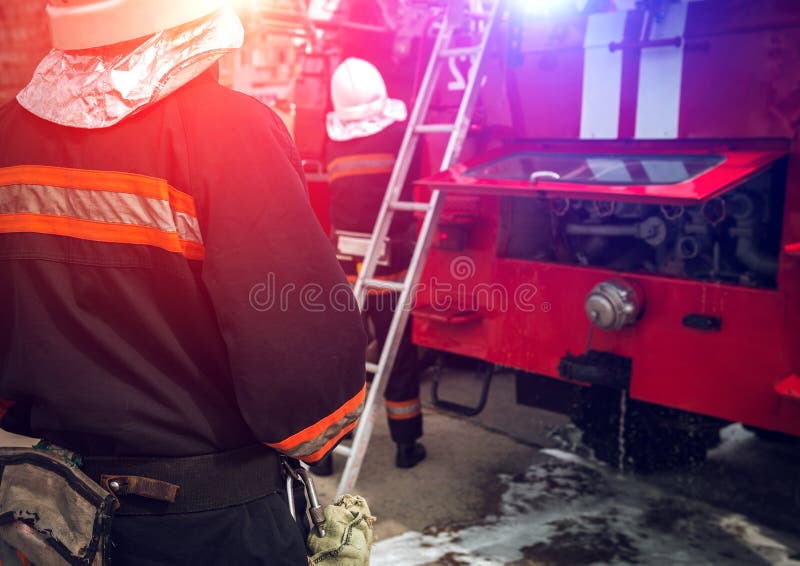 Fire Truck To Put Out Fire. Firefighters To Extinguish the Fire Stock ...