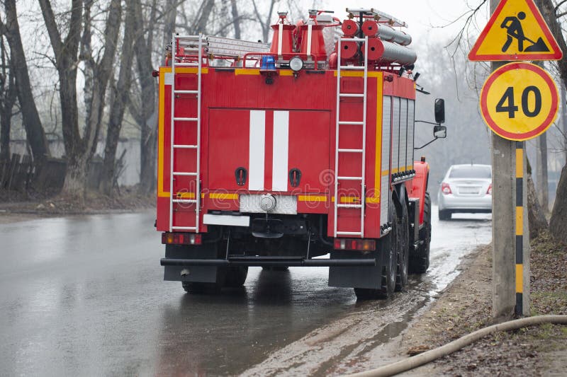 A Fire Truck on Fire.the Work of Firefighters on Fire Editorial Stock ...