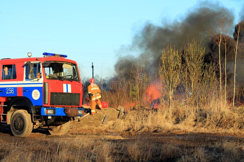 Fire trucks editorial image. Image of field, work, plant - 39369945