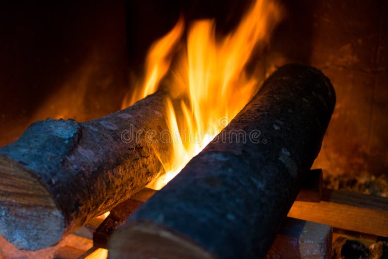 Fire and Wood Burning in a Fireplace. Close-up Image Stock Photo ...