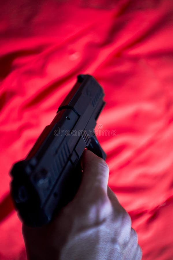 Firearm held by a man stock image. Image of focus, range - 121392923
