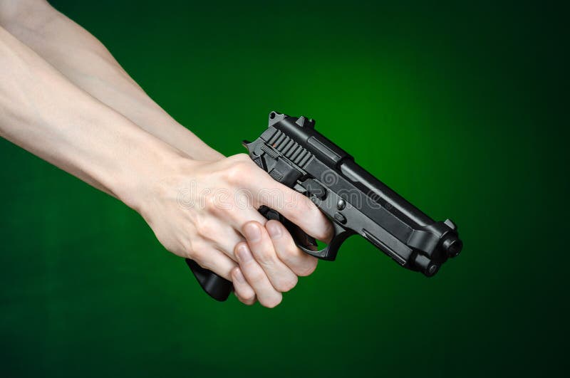 Human Hand Holding Gun Stock Photos - Download 1,835 Royalty Free Photos