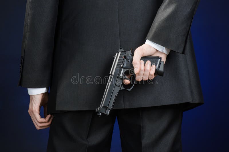 1,899 Man Gun Blue Background Stock Photos - Free & Royalty-Free Stock ...