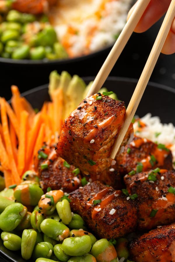 Firecracker Salmon Poke Bowl with Edamame, Avocado Carrot and Rice ...