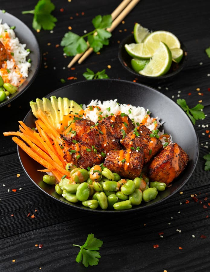 Firecracker Salmon Poke Bowl with Edamame, Avocado Carrot and Rice ...