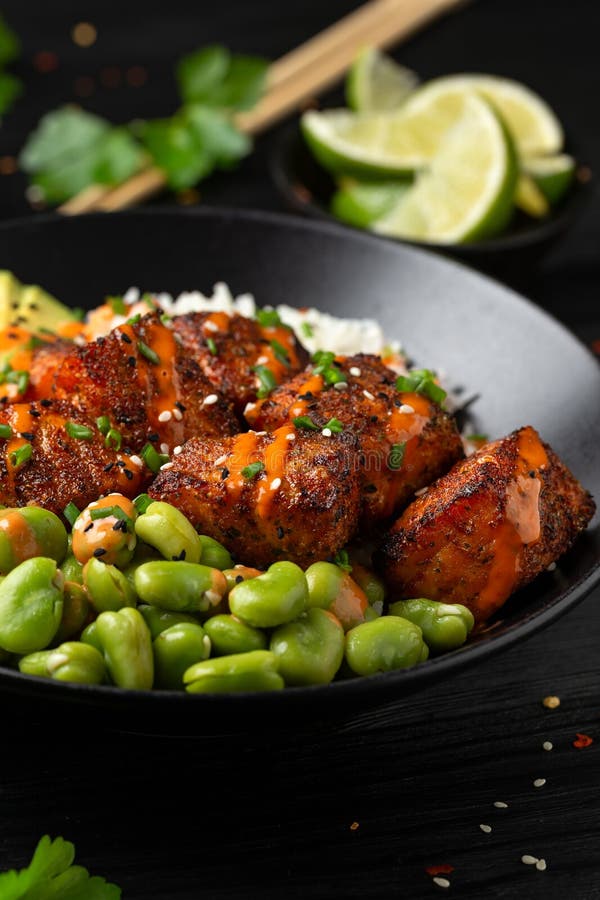 Firecracker Salmon Poke Bowl with Edamame, Avocado Carrot and Rice ...