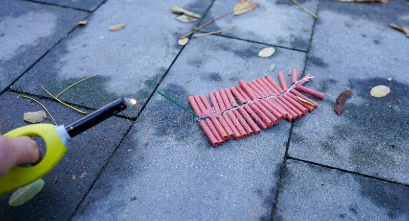 Firecrackers Strip on the Ground Stock Image - Image of snow, iron ...