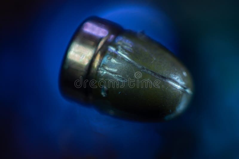 Bullet Fired From A Gun Isolated On Black Stock Image - Image of ...