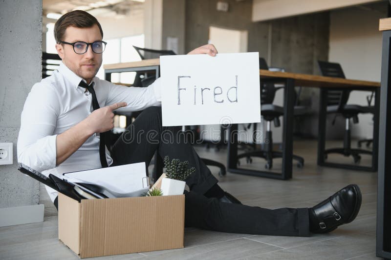 Fired Employee Holding Fired Sign in Hand Stock Image - Image of office ...