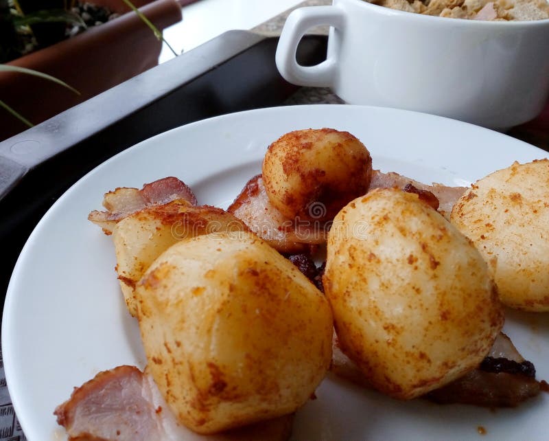 Fired potatoes with bacon stock image. Image of fired - 60642837
