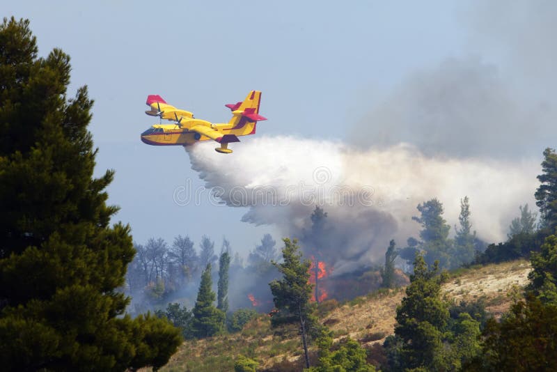 Firefghter Water Bomber Airplane Dumping Its Load Stock Photo - Image ...