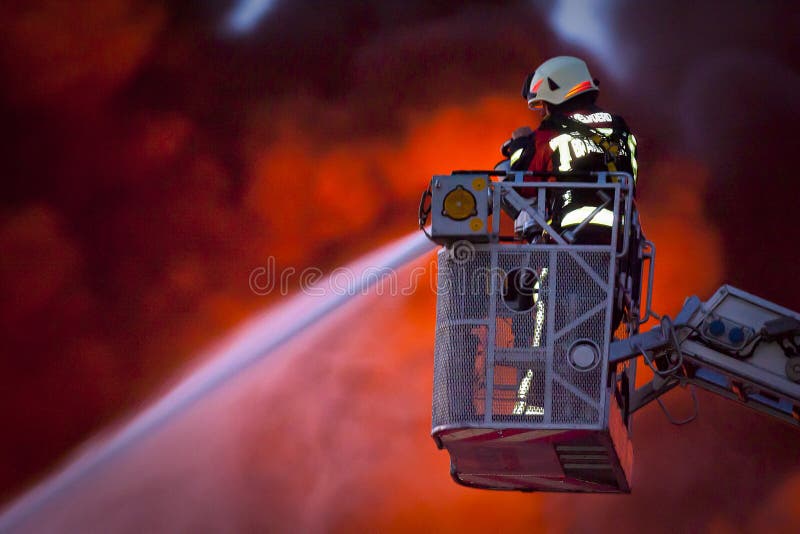 Firefighter in action stock image. Image of danger, voorhout - 19487193
