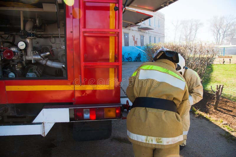 Firefighter in action stock photo. Image of protective - 165466116