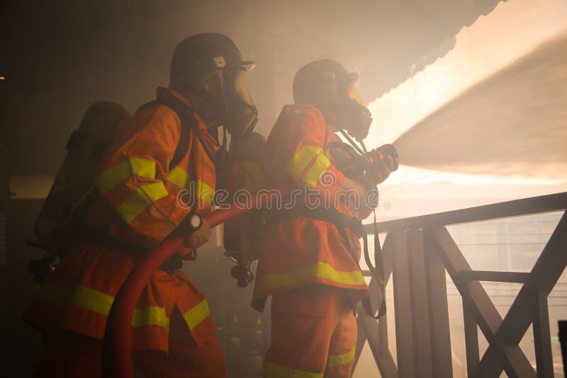 Firefighter in action editorial image. Image of billowing - 206850065