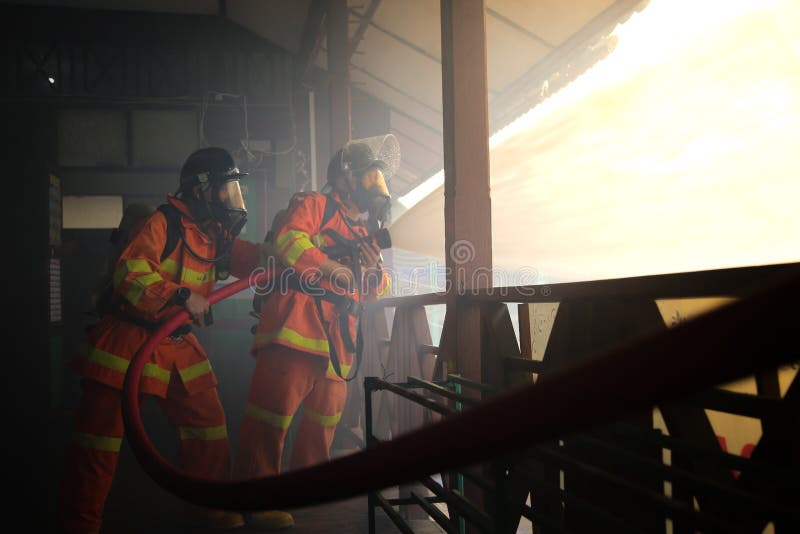 Firefighters Inside the Fire Stock Image - Image of protection, gear ...