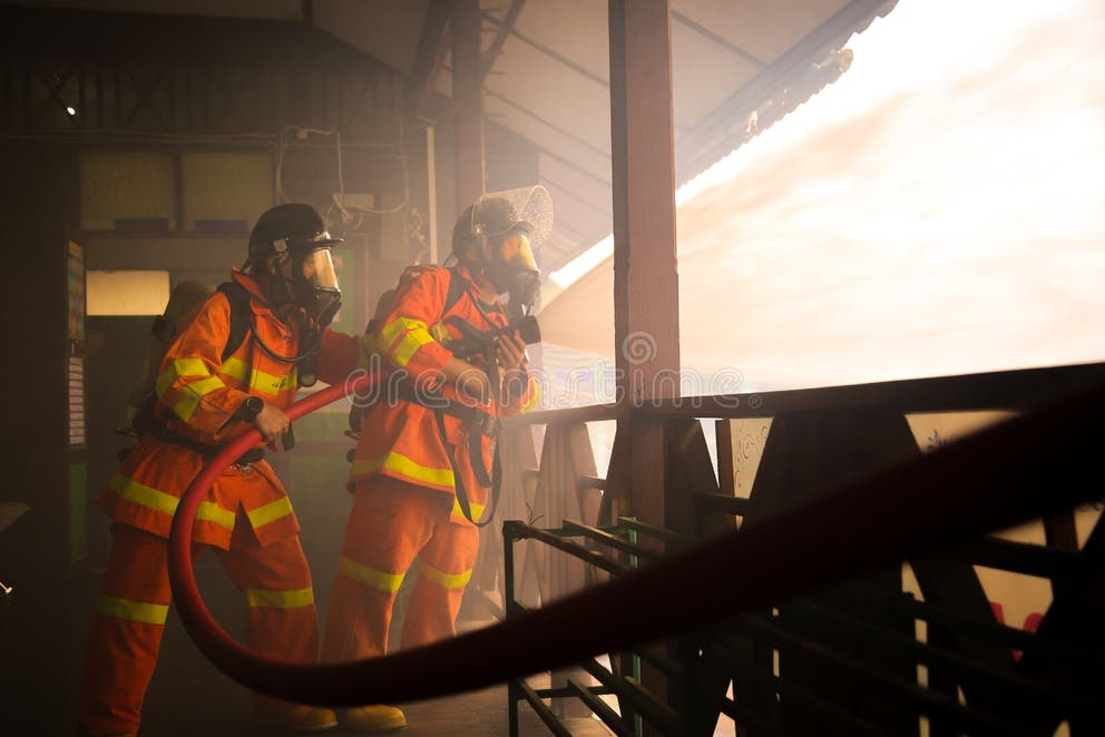 Firefighter in action editorial photo. Image of firefighters - 206850086