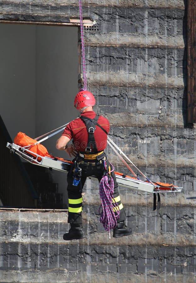 Firefighter in Action with Foam To Put Out the Fire Stock Photo - Image ...