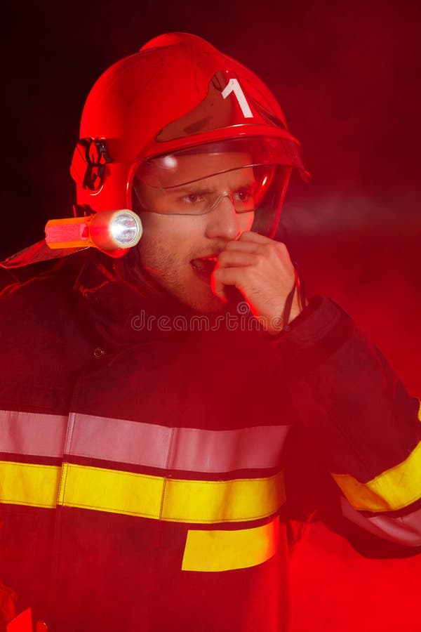 Firefighter in Action Using Walkie-talkie Stock Image - Image of cutout ...