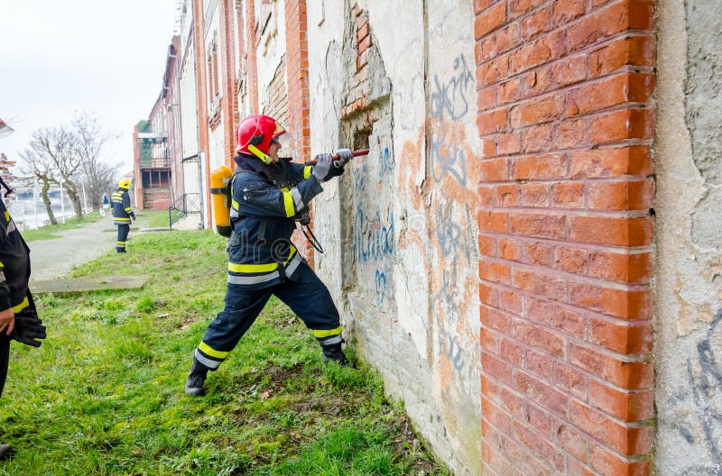 Firefighter is Breaking through Wall, Estimating Current Situation ...