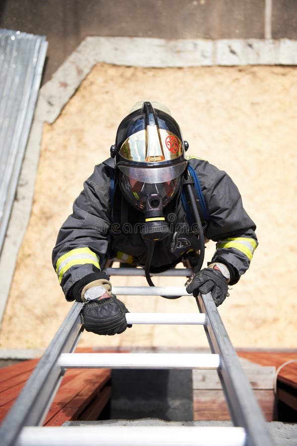 Firefighter Climb on Fire Stairs Stock Image - Image of mask, danger ...