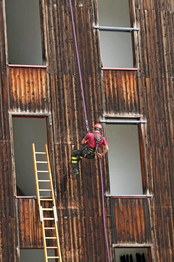 Firefighter Climbing during the Ascent Abseiling from a Building ...