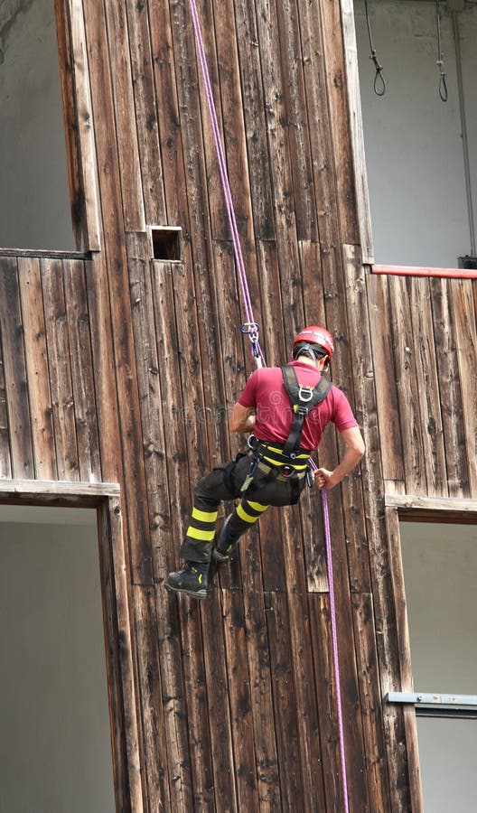 Firefighter Climbing during the Ascent Abseiling from a Building ...