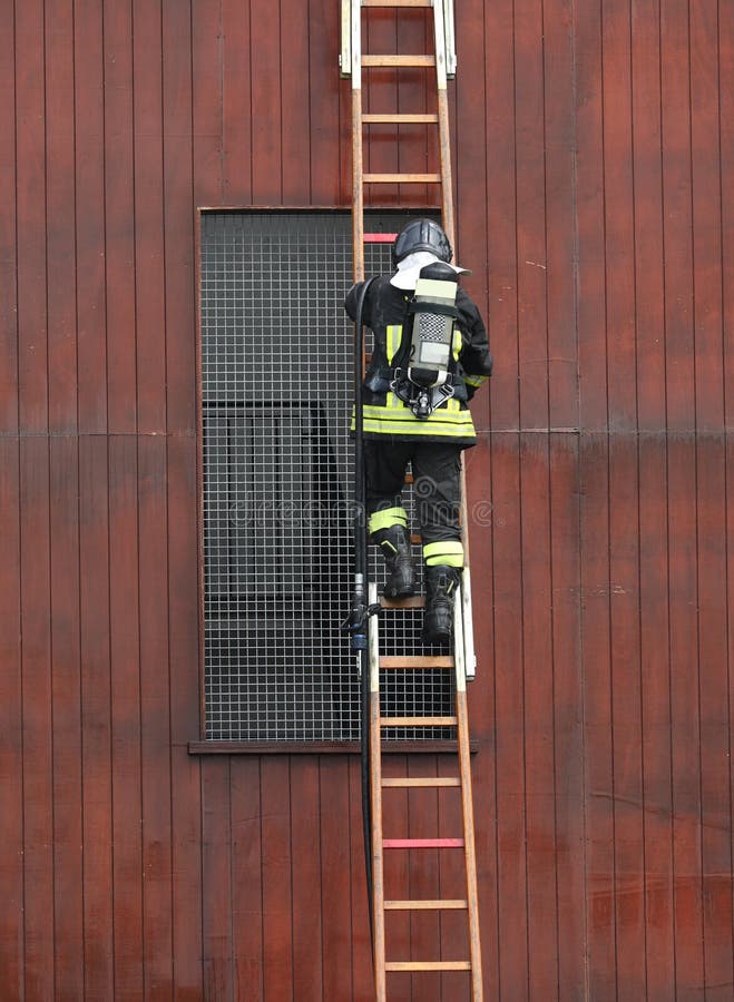 Firefighter Ladder Climb stock image. Image of ladder - 18717087