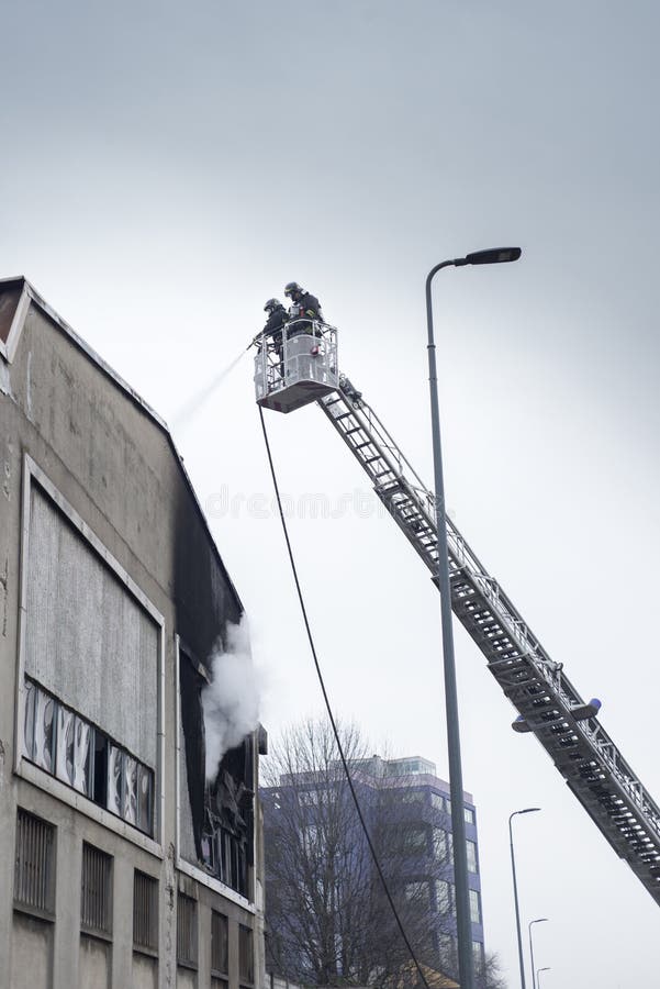 Firefighter Battling Structure Stock Photos - Free & Royalty-Free Stock ...