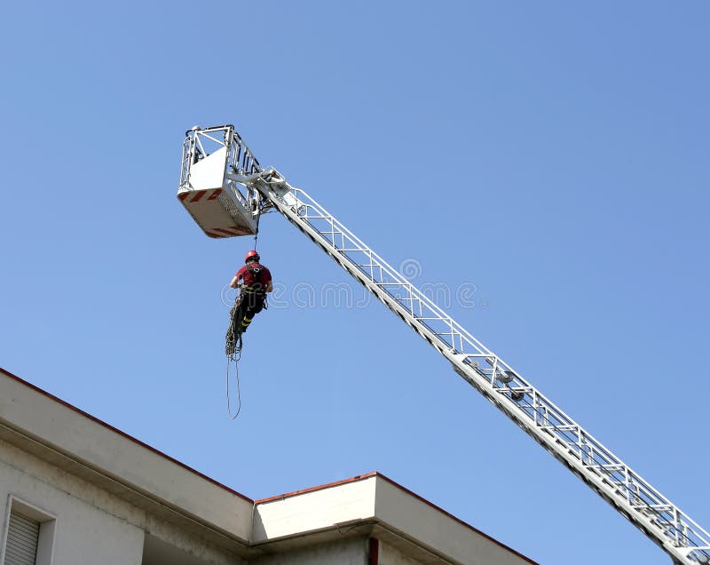 Firefighter Down with the Rope in the Building during a Fire Ala Stock ...