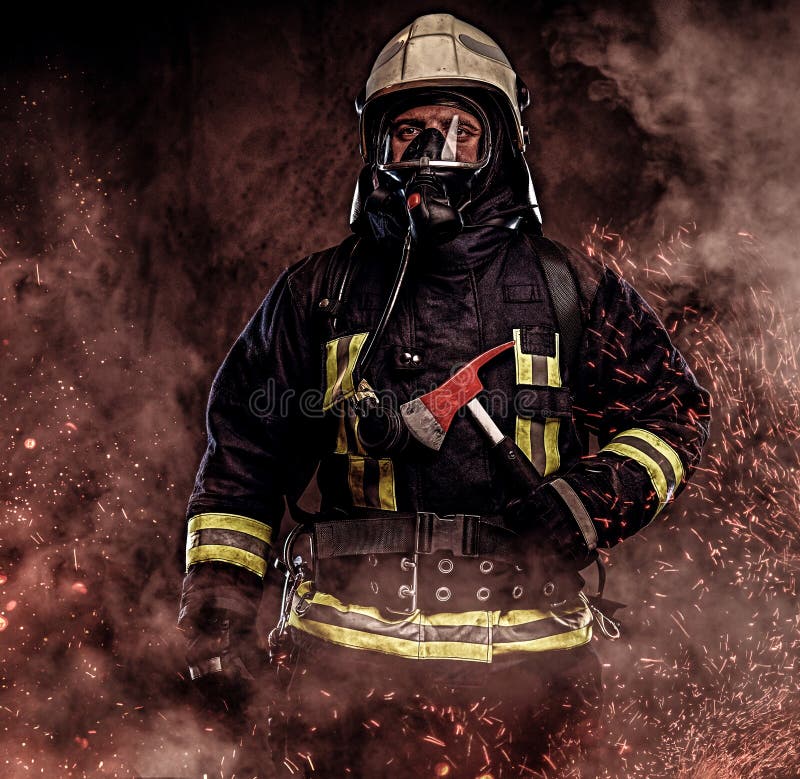 A Firefighter Dressed in a Uniform in a Studio. Stock Photo - Image of ...