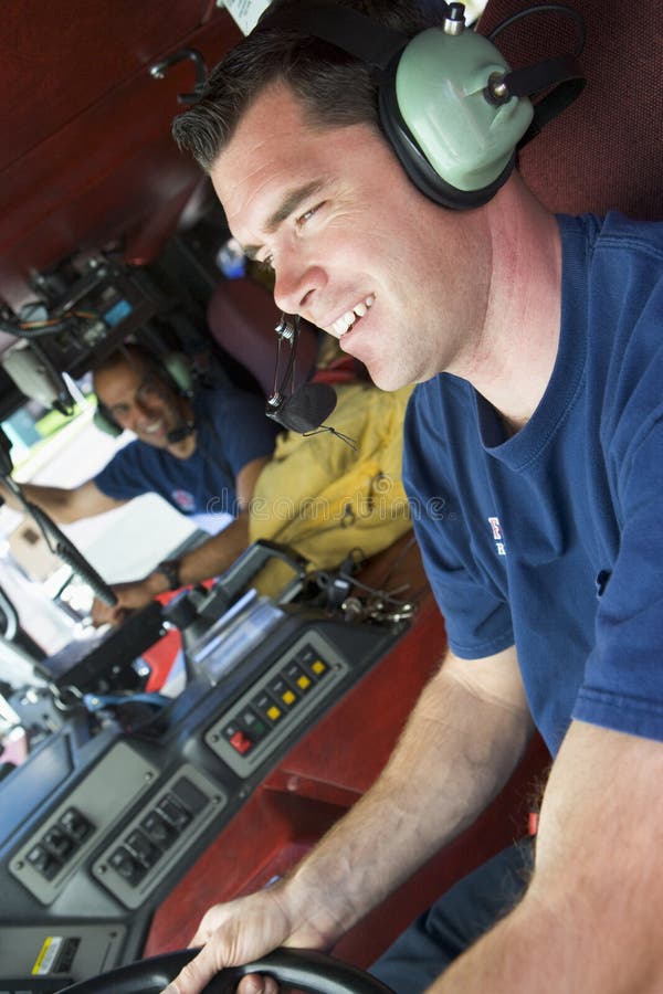Portrait of Firefighters Standing by a Fire Engine Stock Photo - Image ...