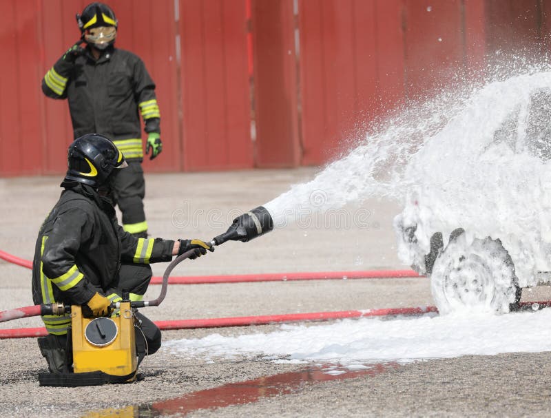Firefighter Extinguishes a Fire in a Car Editorial Stock Photo - Image ...