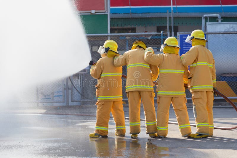 Firefighter Fighting for a Fire Attack Stock Photo - Image of glove ...