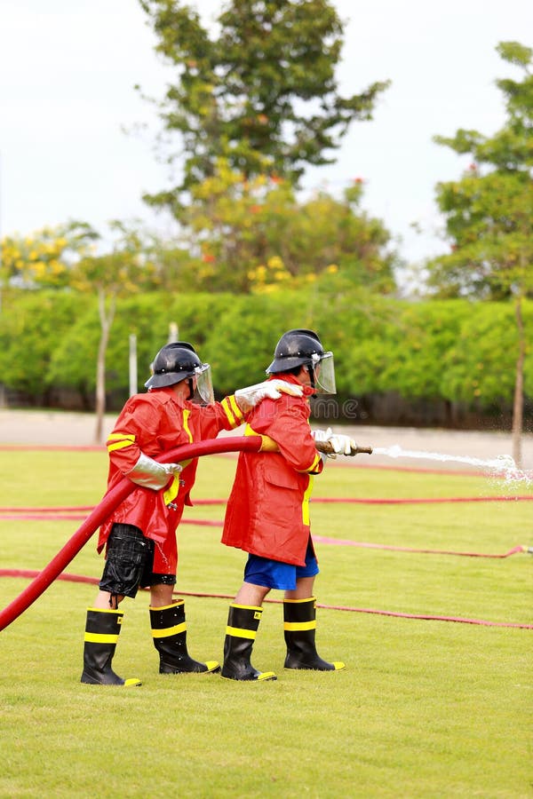 Firefighter Fighting for Fire Attack Training Stock Photo - Image of ...