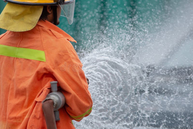 Firefighter Fighting for a Fire Attack, during a Training Exercise ...