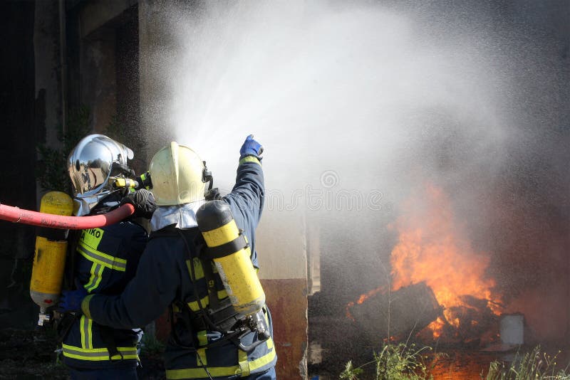 Firefighter Fighting for a Fire Attack, during a Training Exercise ...